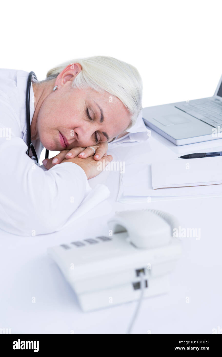 doctor sleeping on her desk Stock Photo - Alamy