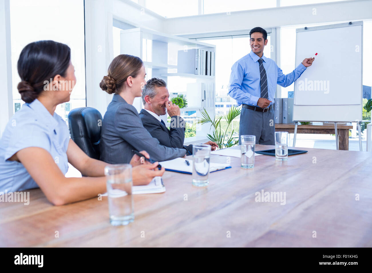 Business people listening during a meeting Stock Photo - Alamy