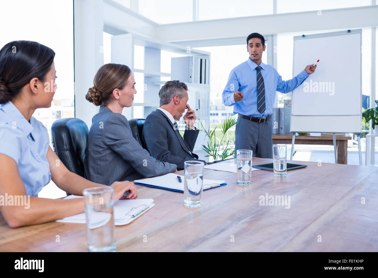 Business people talking during a meeting Stock Photo - Alamy