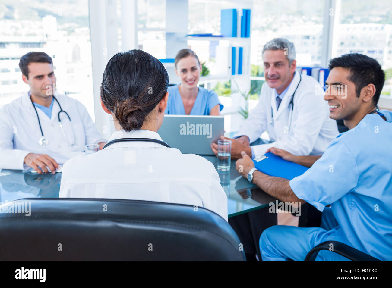 Doctors having a meeting Stock Photo - Alamy