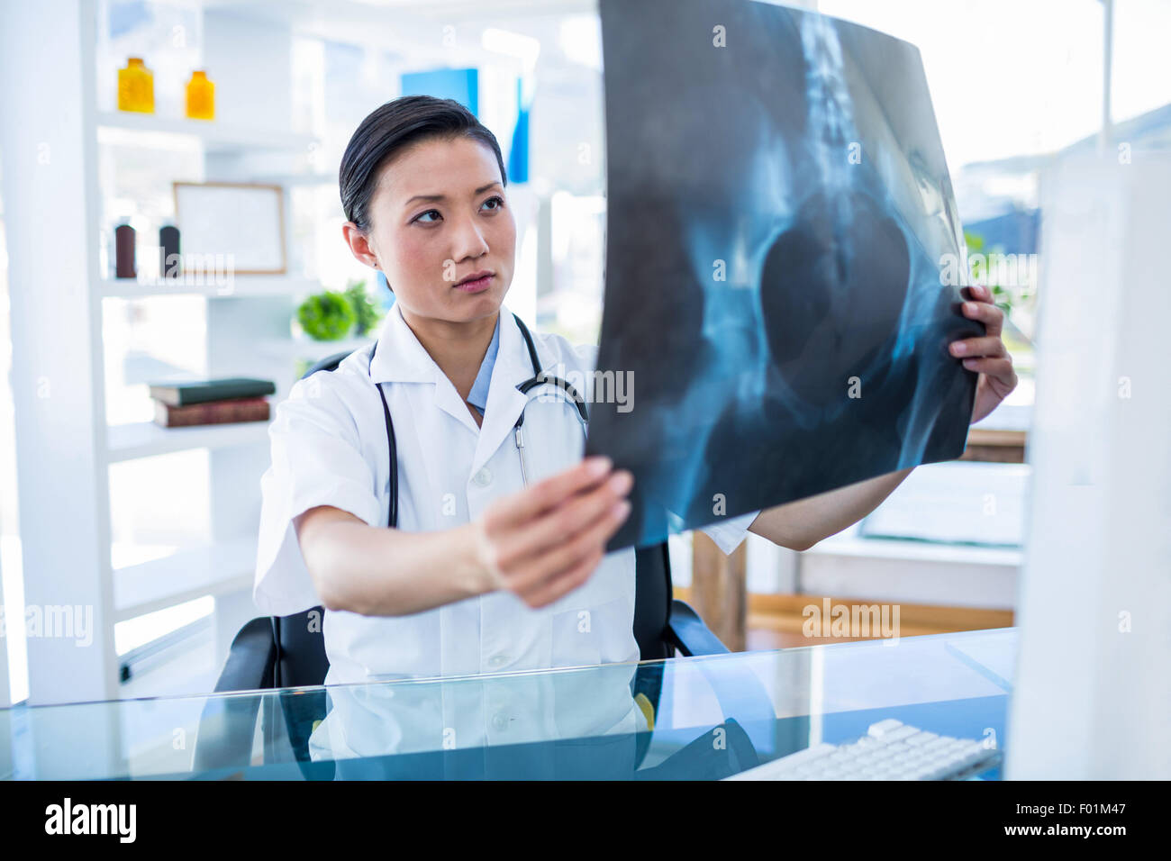 Doctor with x rays hi-res stock photography and images - Alamy