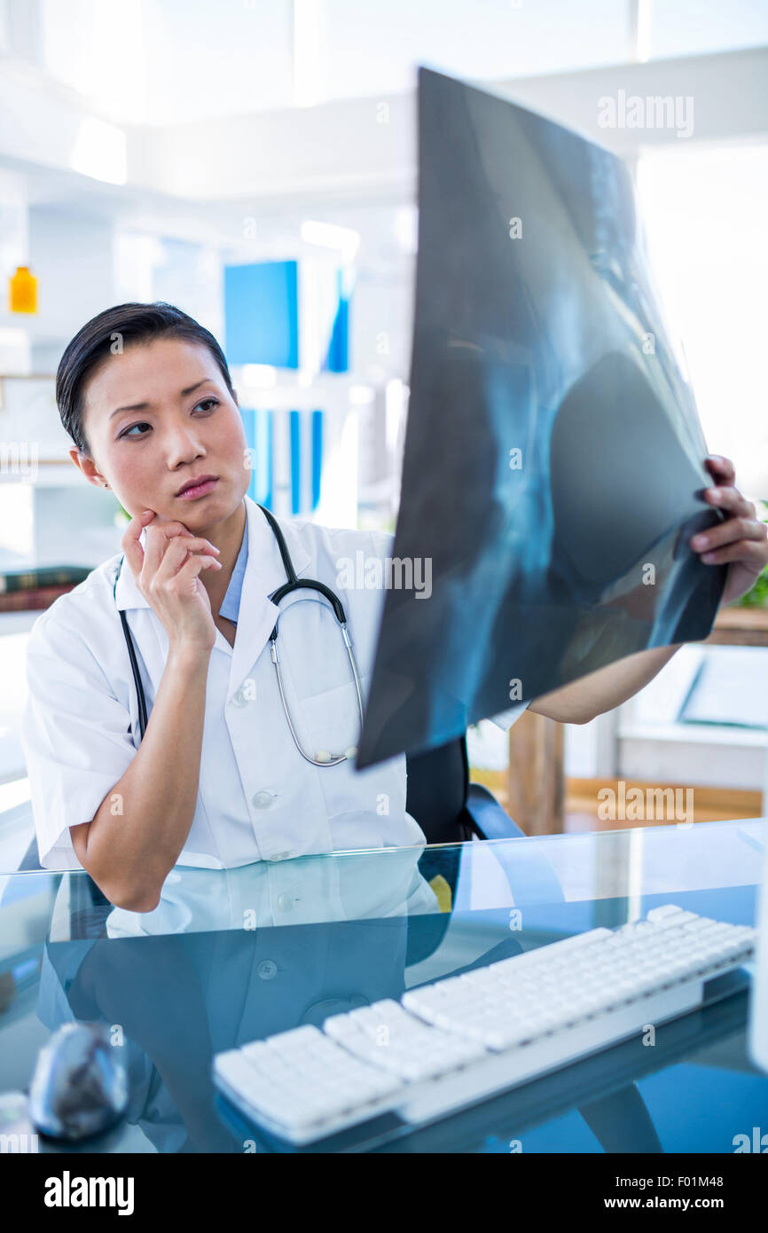 Doctor with x rays hi-res stock photography and images - Alamy