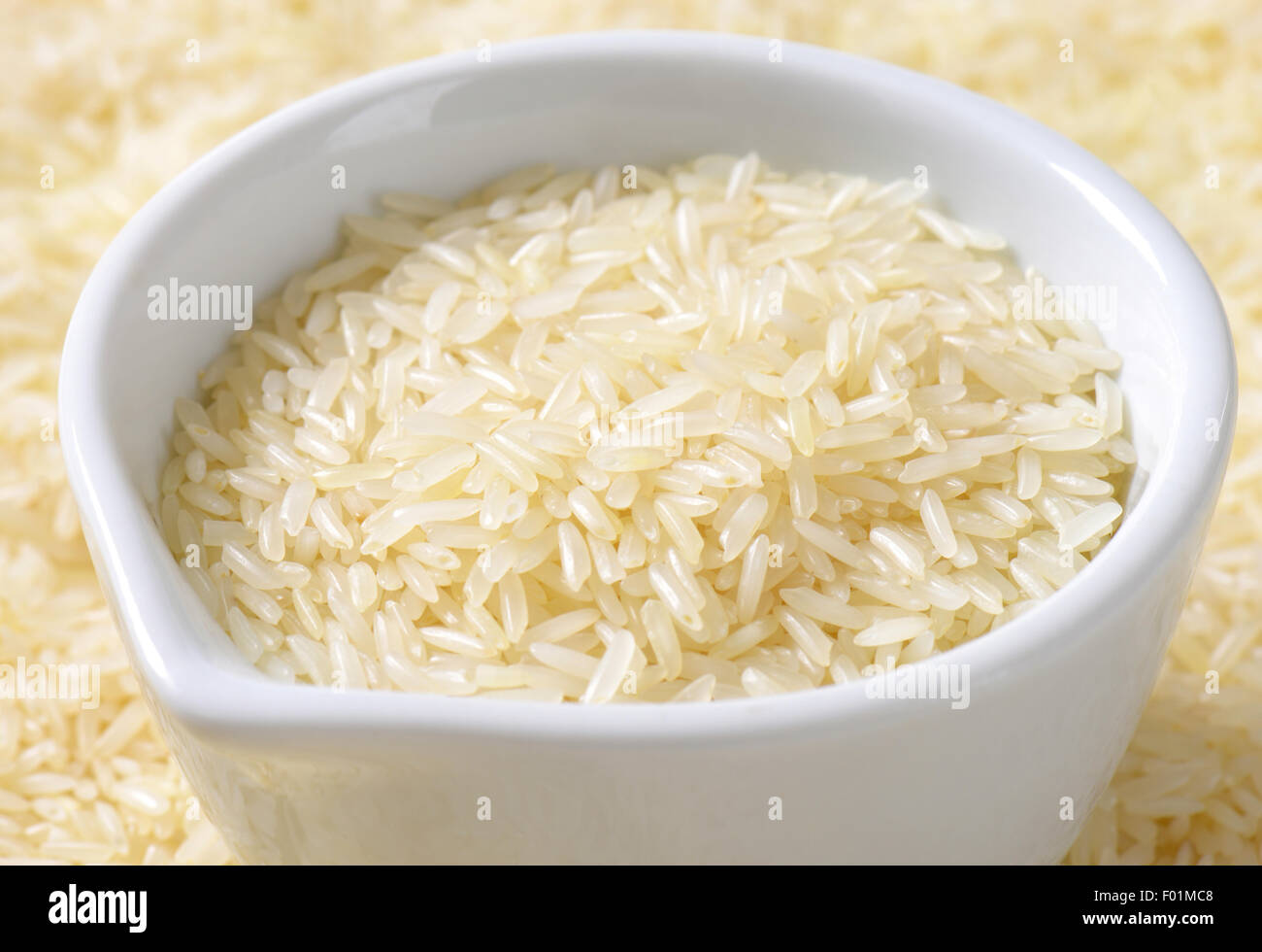 Bowl of uncooked Thai Jasmine rice Stock Photo - Alamy