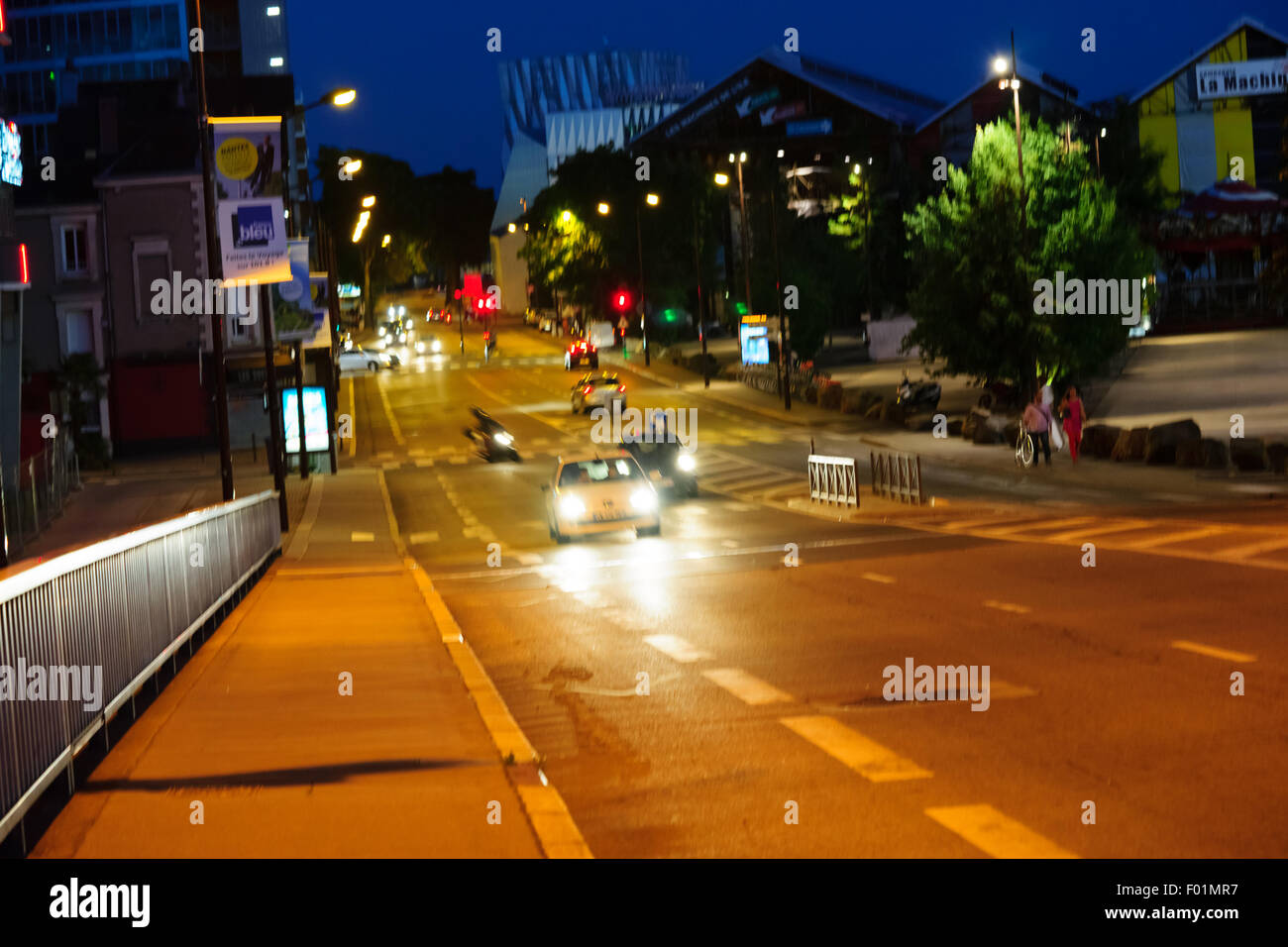 night time street scene nantes france Stock Photo - Alamy