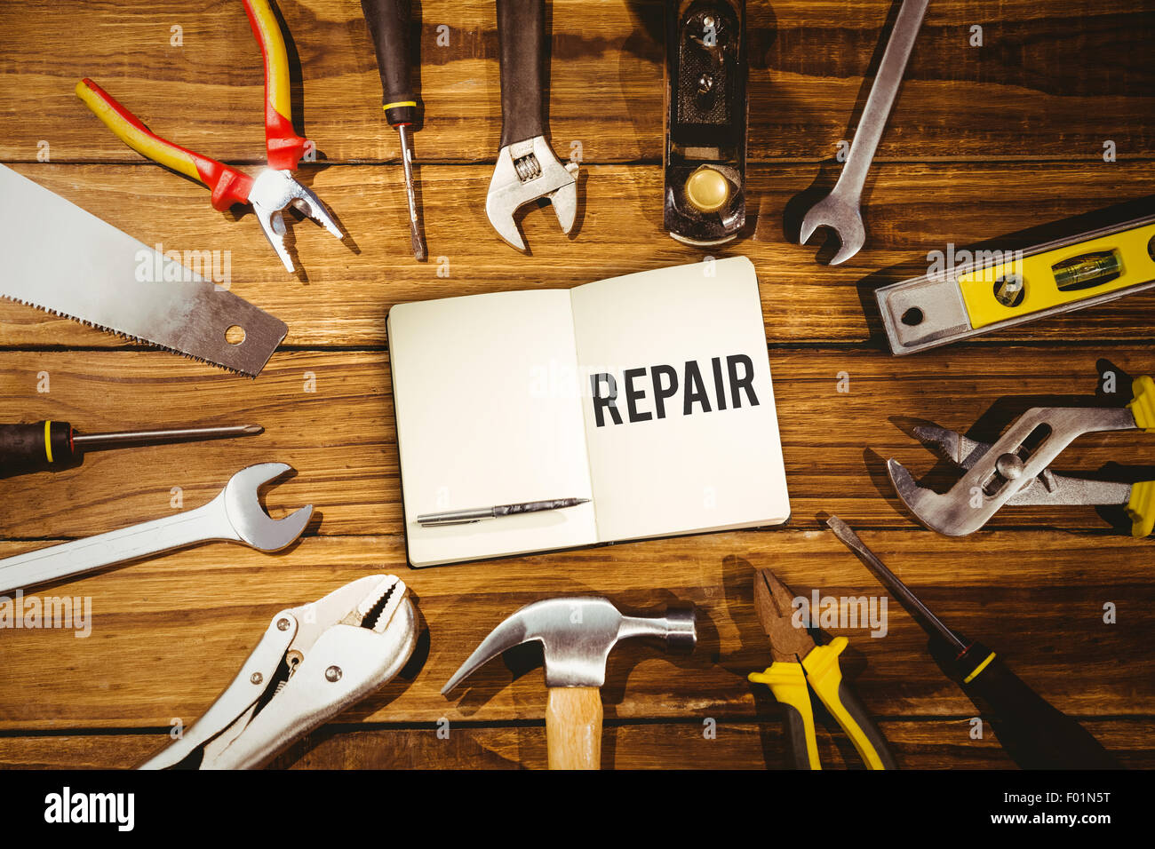 Repair against tools on desk Stock Photo - Alamy
