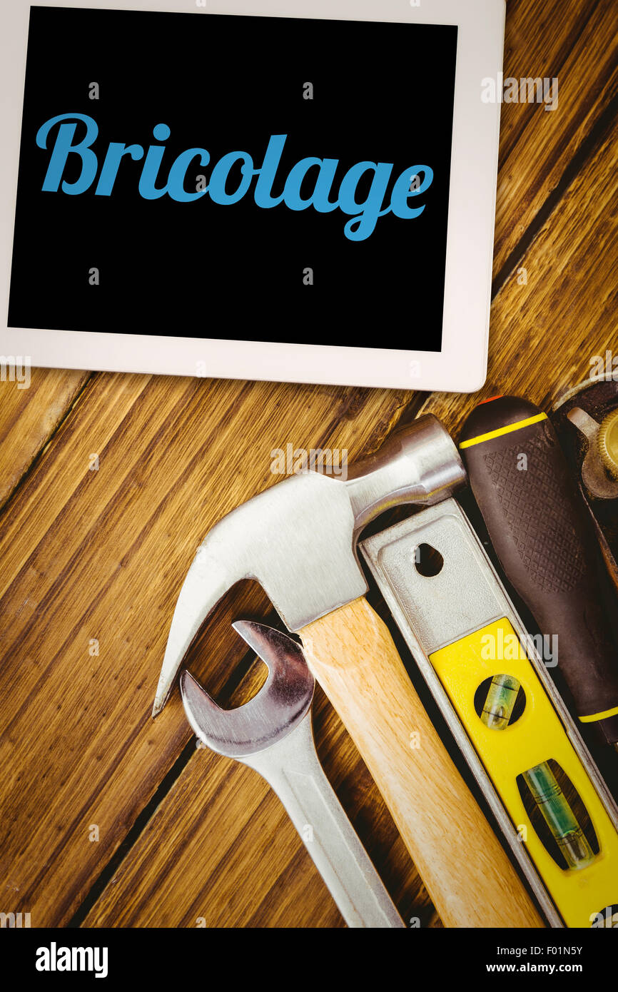Bricolage against desk with tools Stock Photo - Alamy