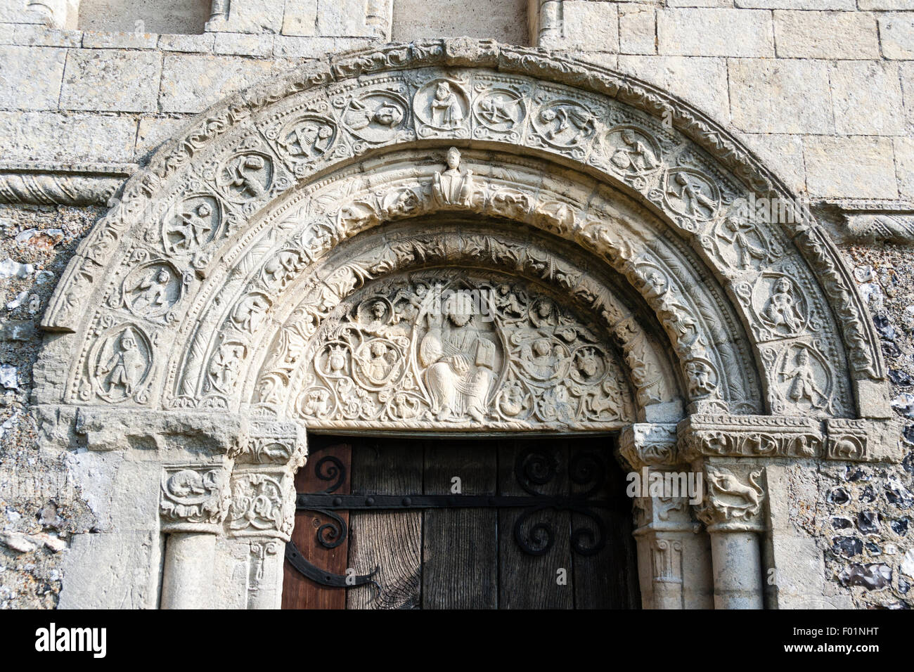 England, Barfrestone. Norman 12th century church carvings. Tympanum ...
