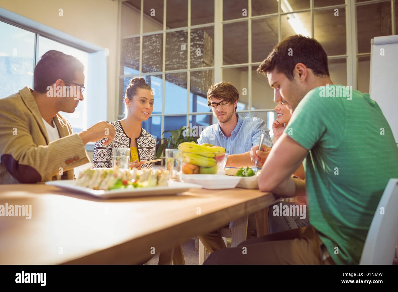 Business people having lunch Stock Photo - Alamy