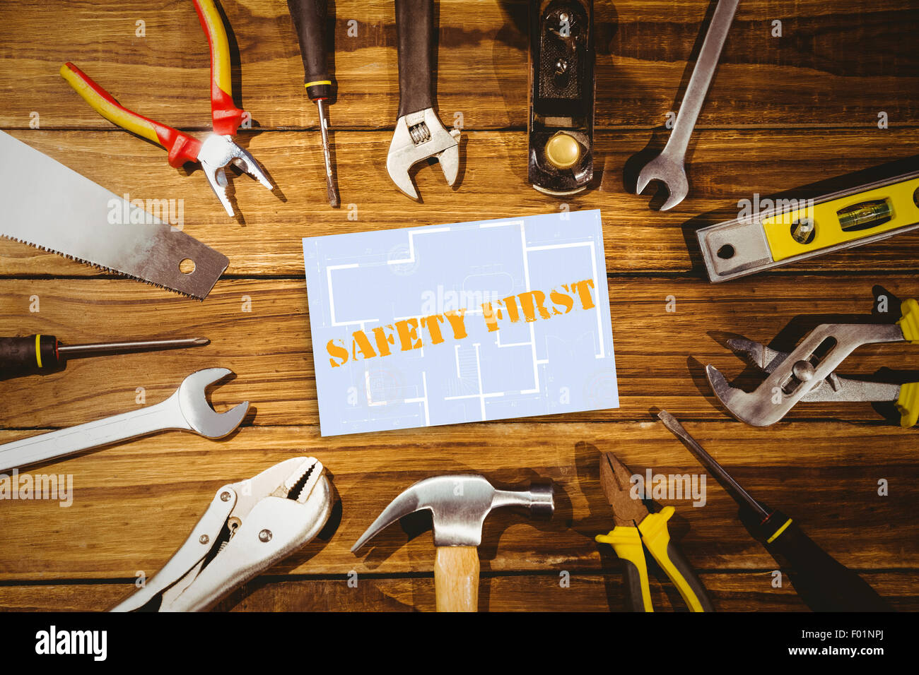 Safety first against white card Stock Photo - Alamy