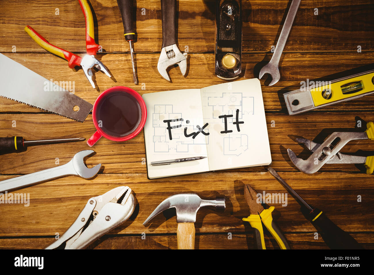 Fix it against blueprint Stock Photo - Alamy