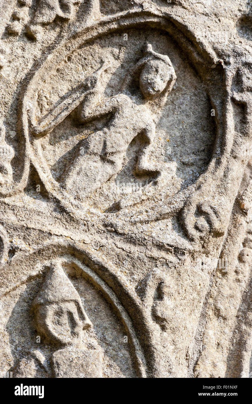 England, Barfrestone church. Norman stone carvings. South door tympanum ...