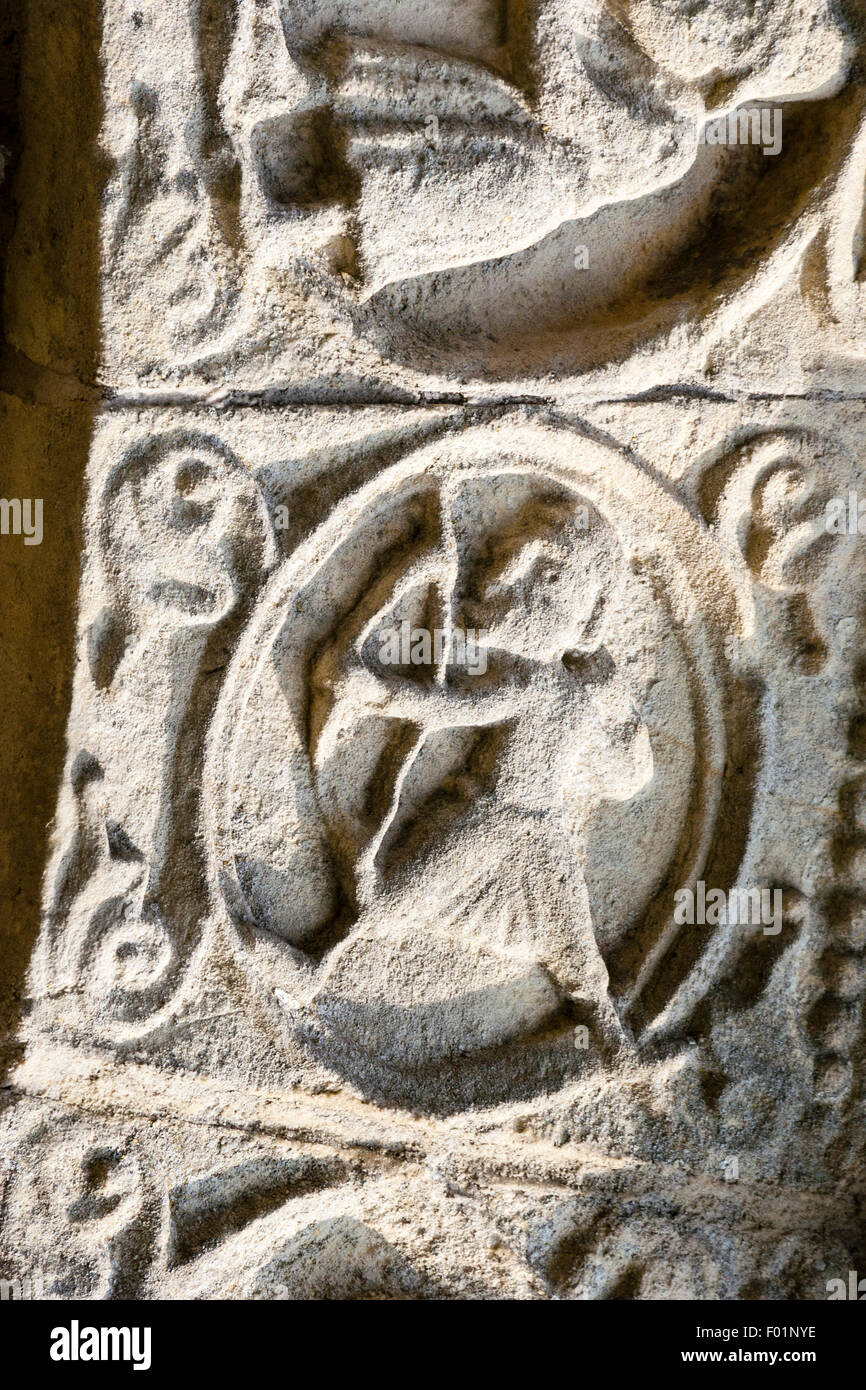 England, Barfrestone church. Norman stone carvings. South Door tympanum ...