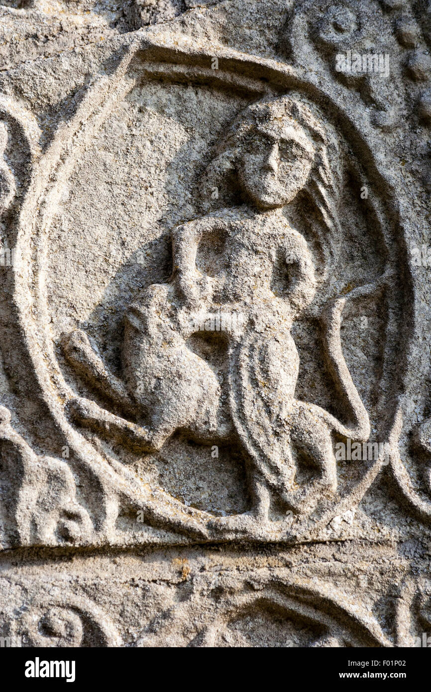 England, Barfrestone church. Norman stone carvings. Tympanum above ...