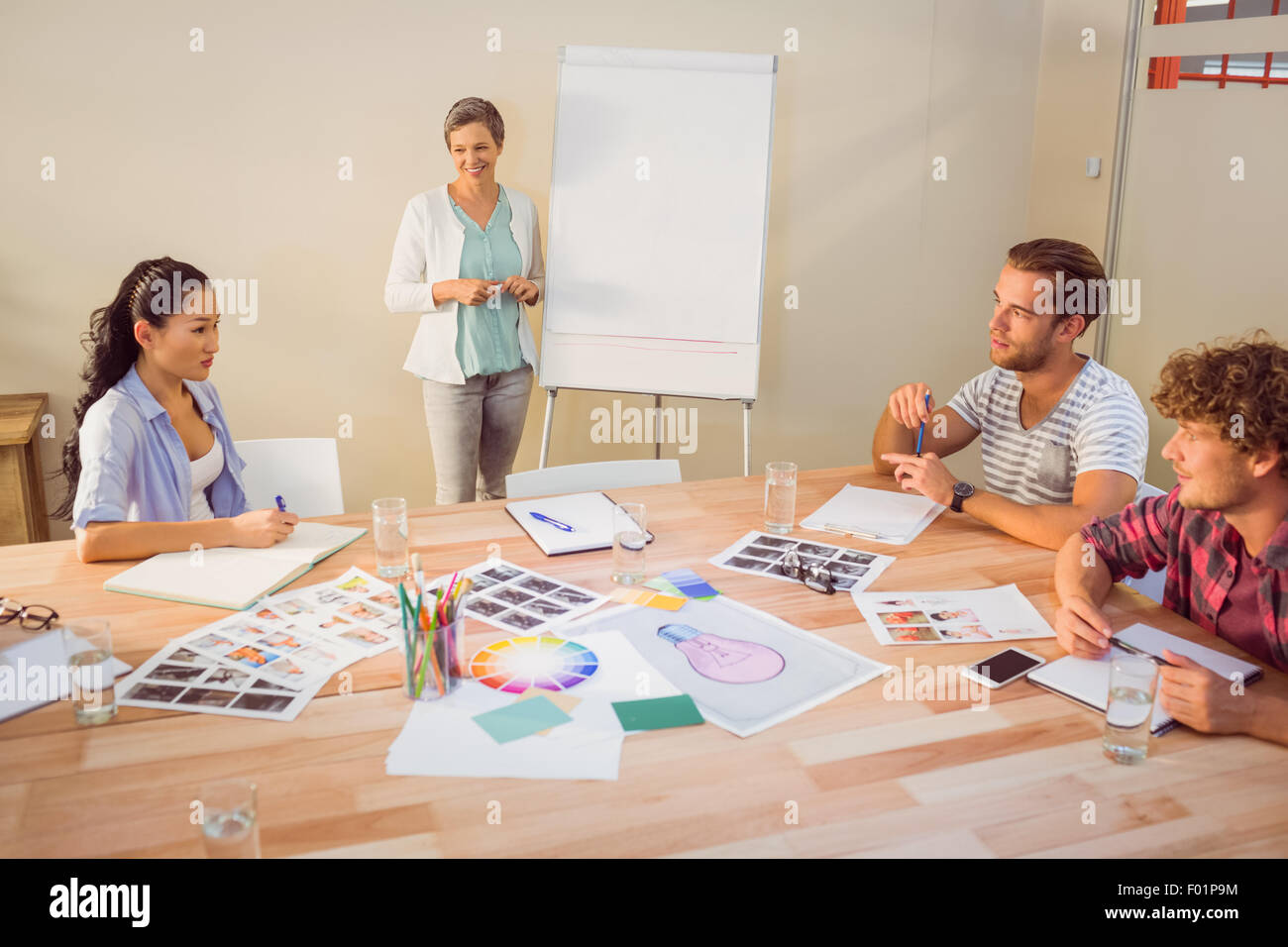 Asian businessman presenting in meeting hi-res stock photography and ...