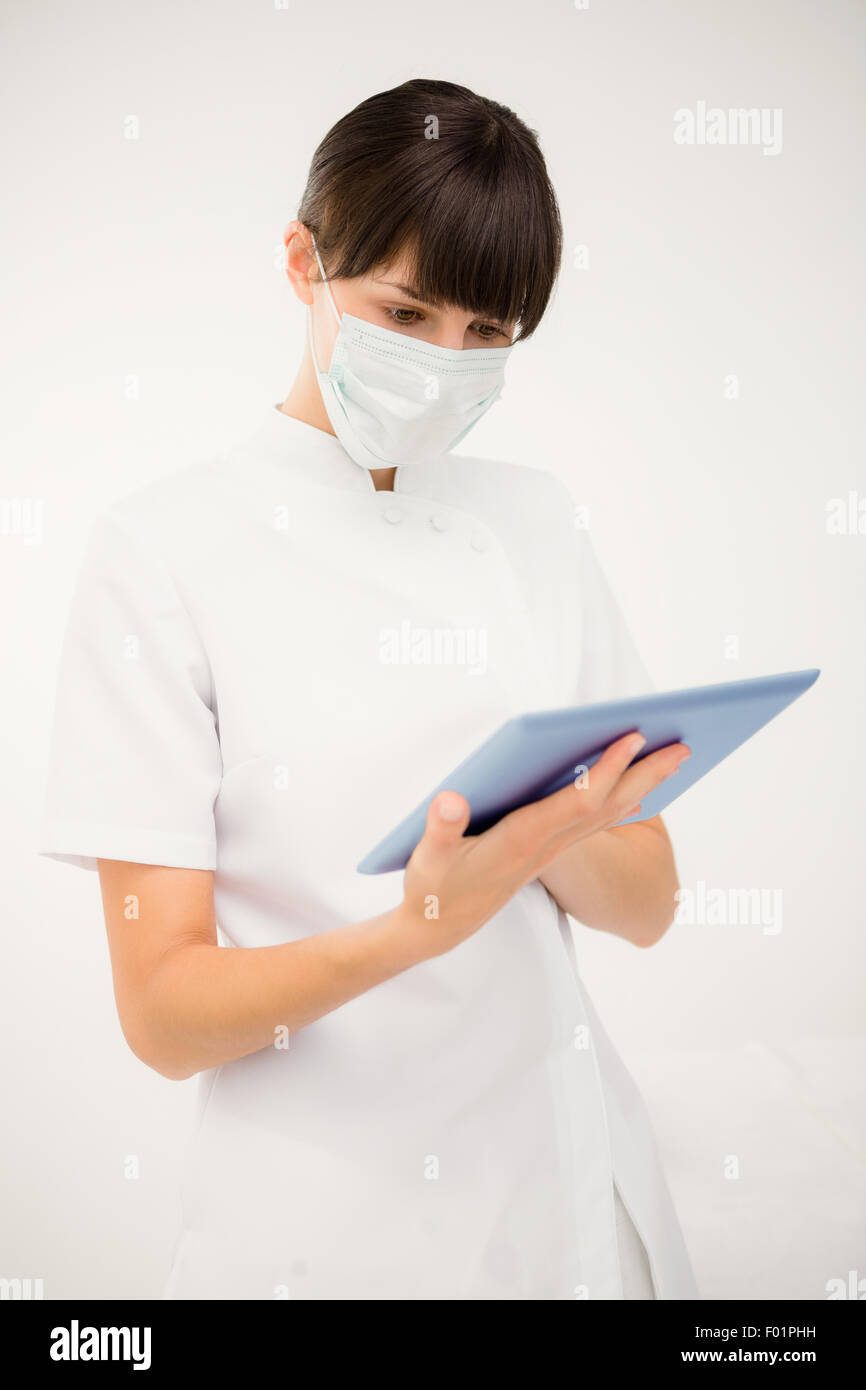 Nurse using a digital tablet Stock Photo - Alamy