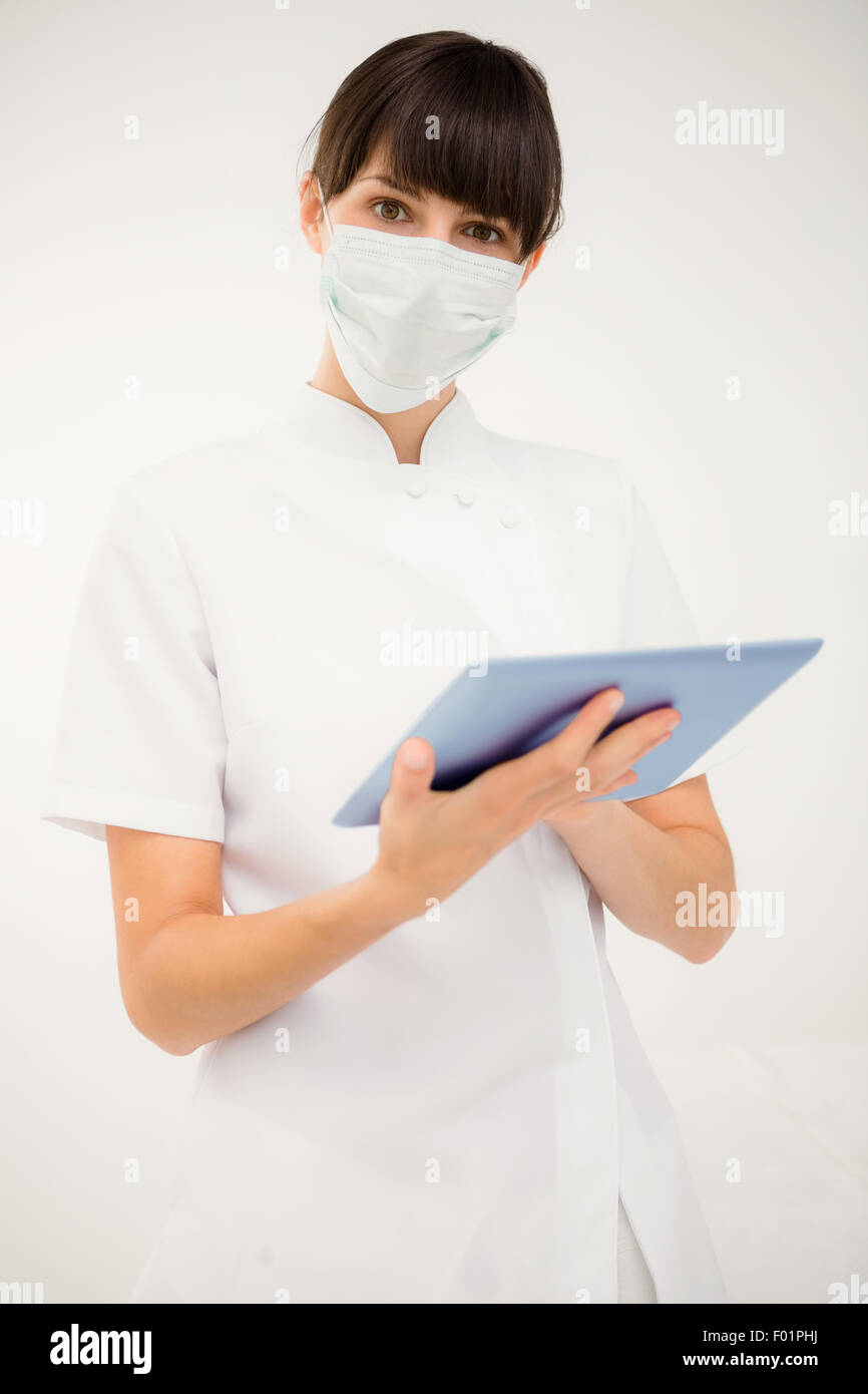 Portrait of a nurse using her digital tablet Stock Photo - Alamy