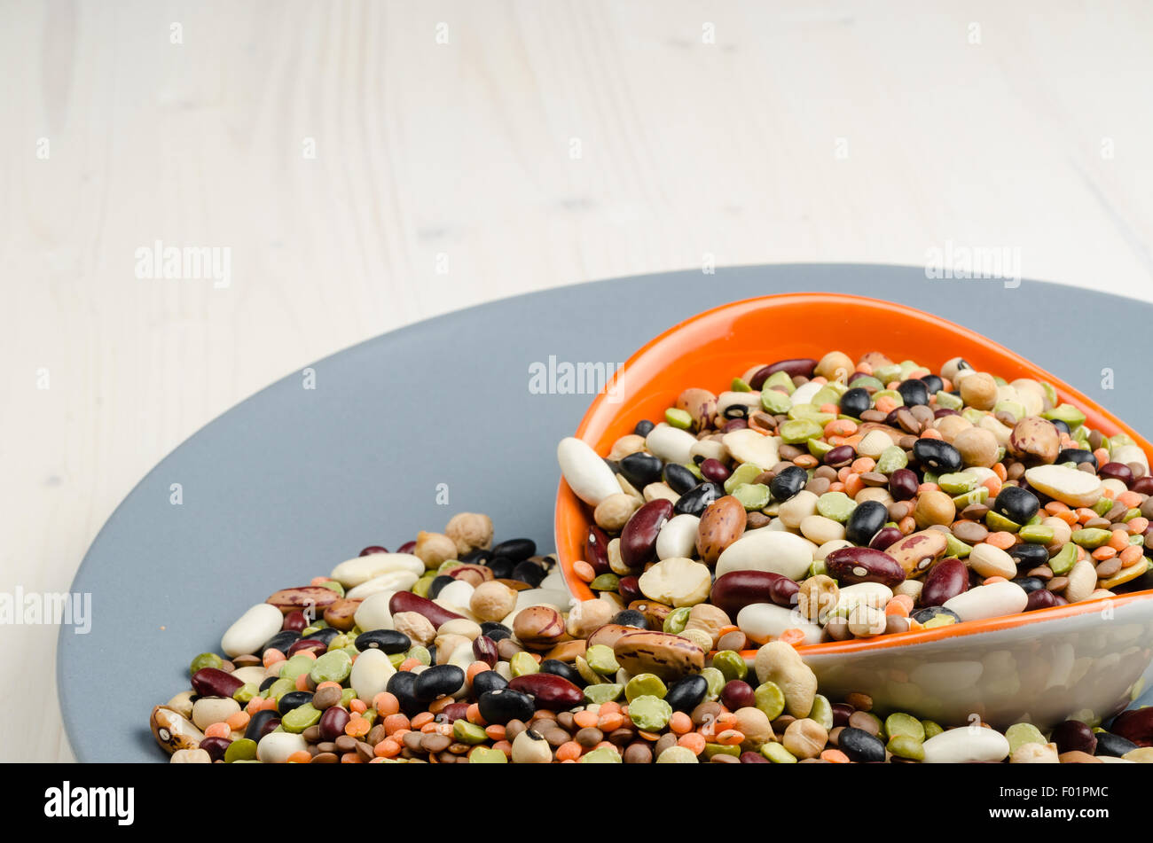 legumes in a dish, close up, background Stock Photo - Alamy