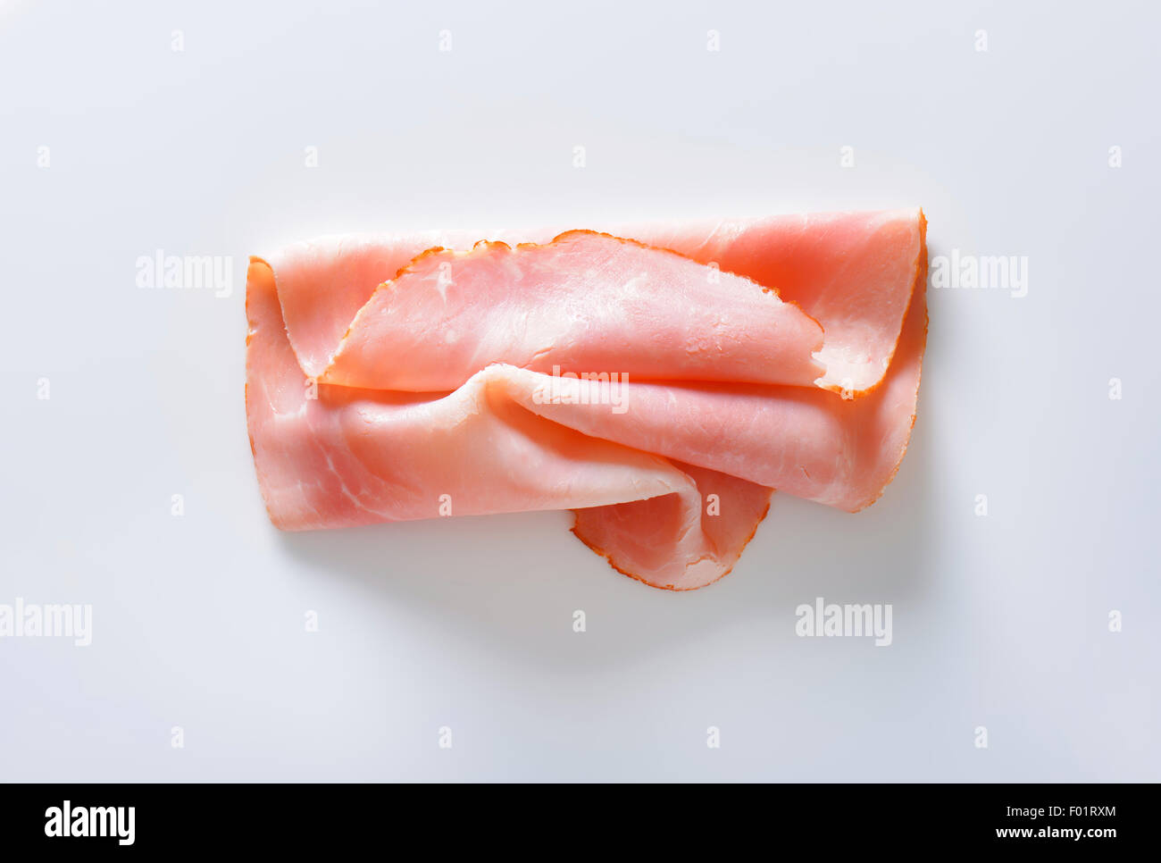 Thin slice of baked ham Stock Photo - Alamy