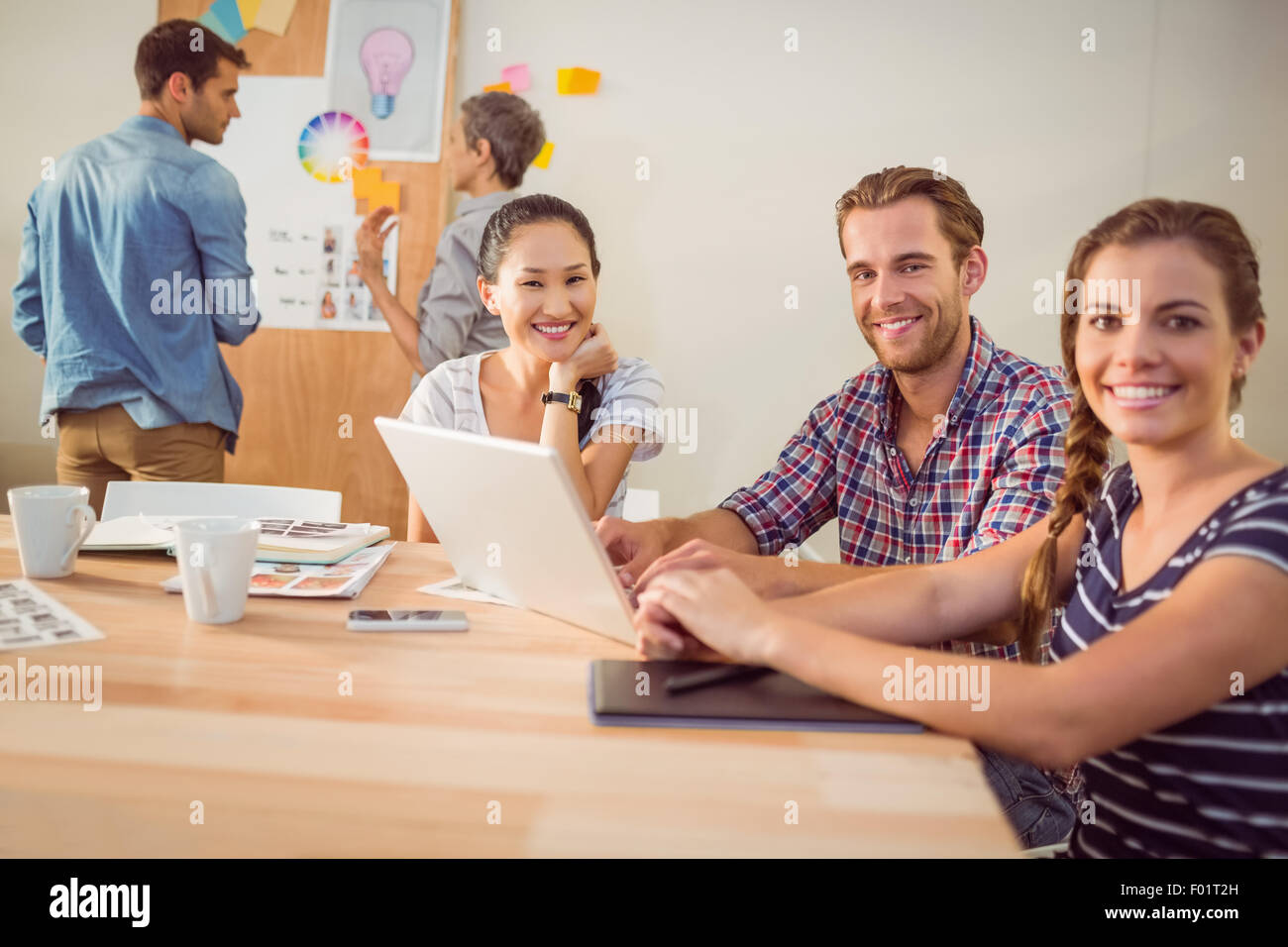 Creative business team working together Stock Photo - Alamy