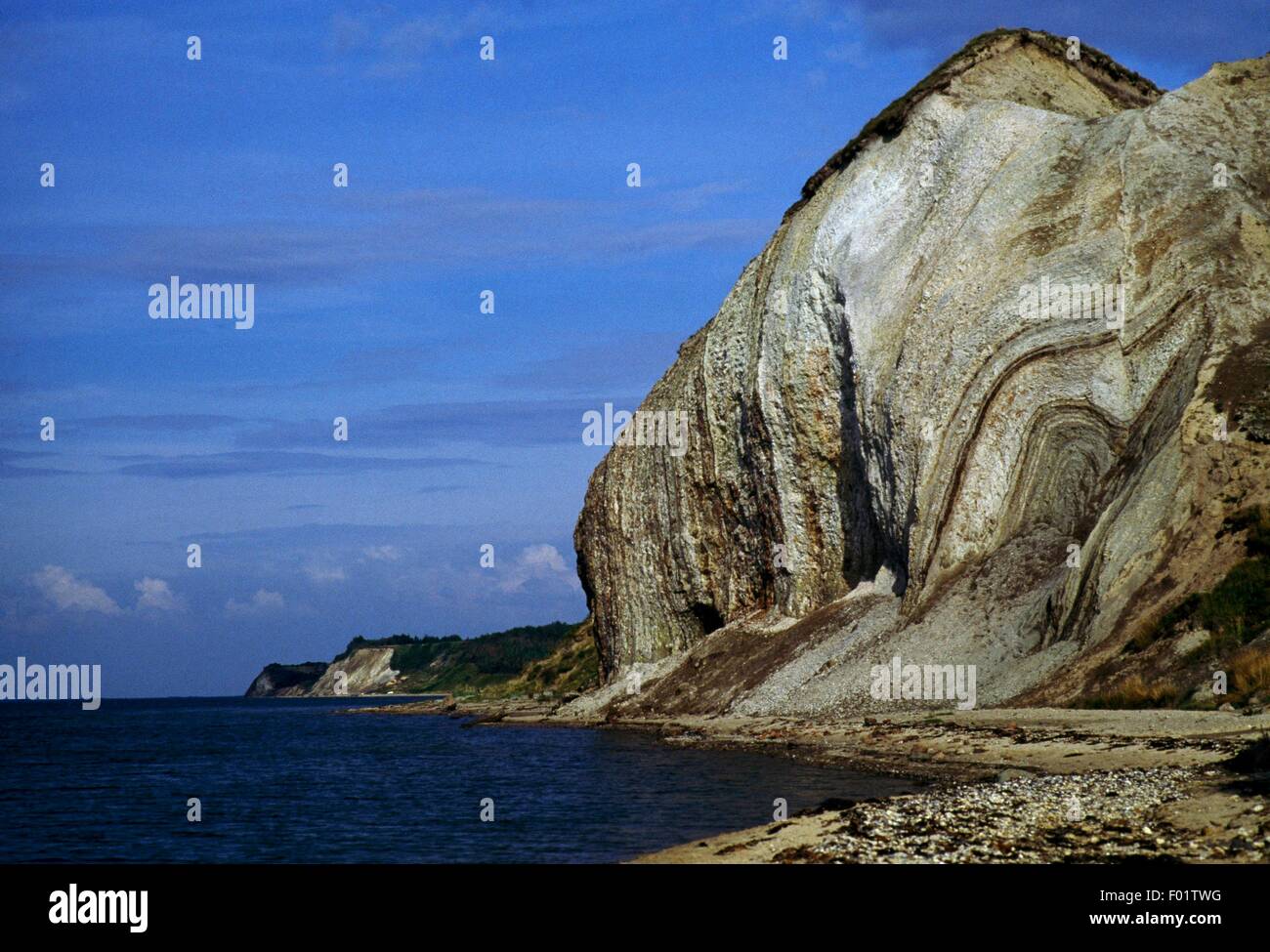 Layers of ash and sedimentary clay visible in the cliff, Fur Island ...