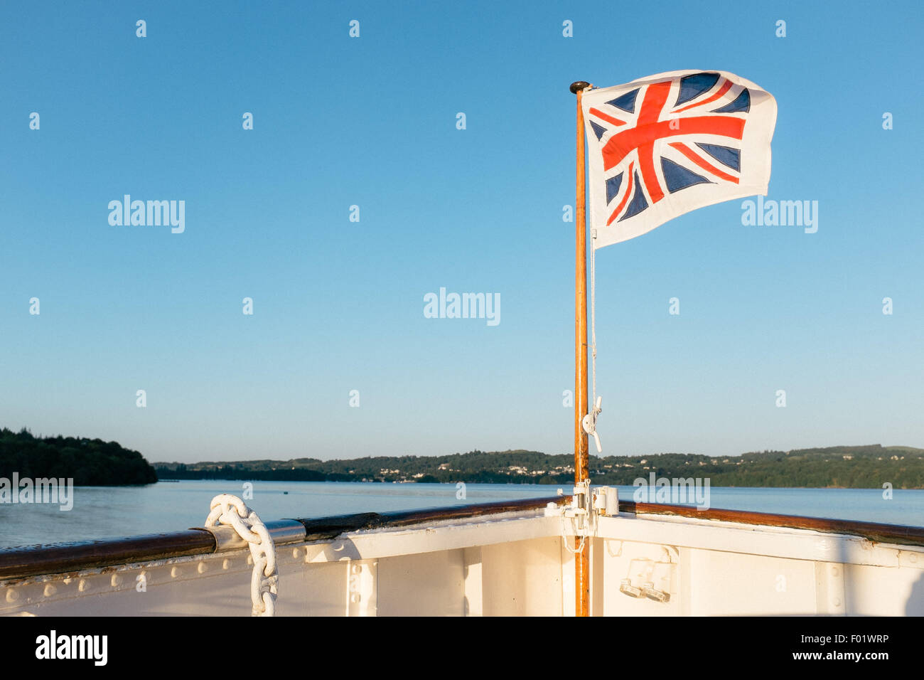 Union Jack on the Prow of a Boat Cruising in the English Lake District ...