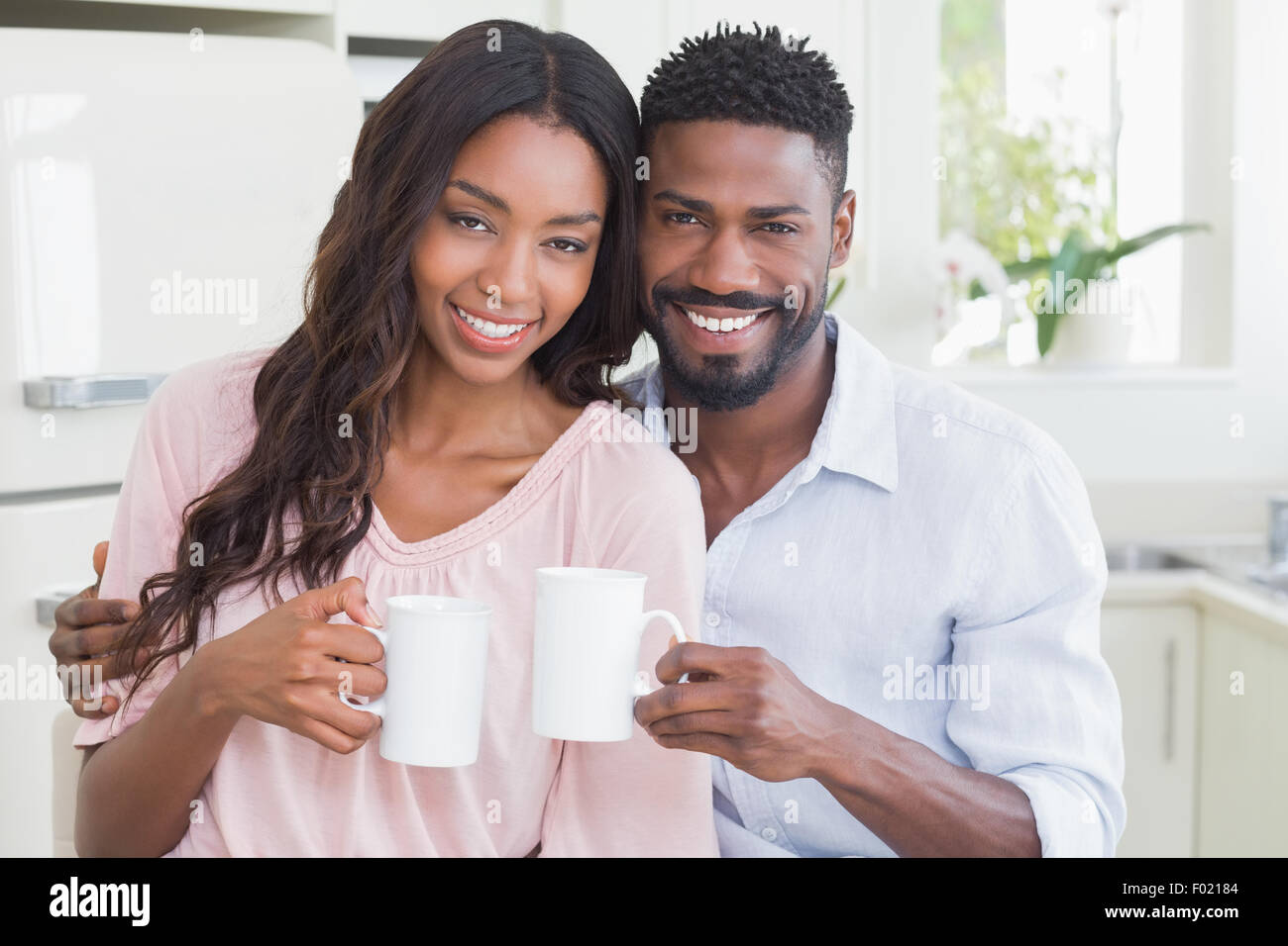 Happy couple having black coffee hi-res stock photography and images ...