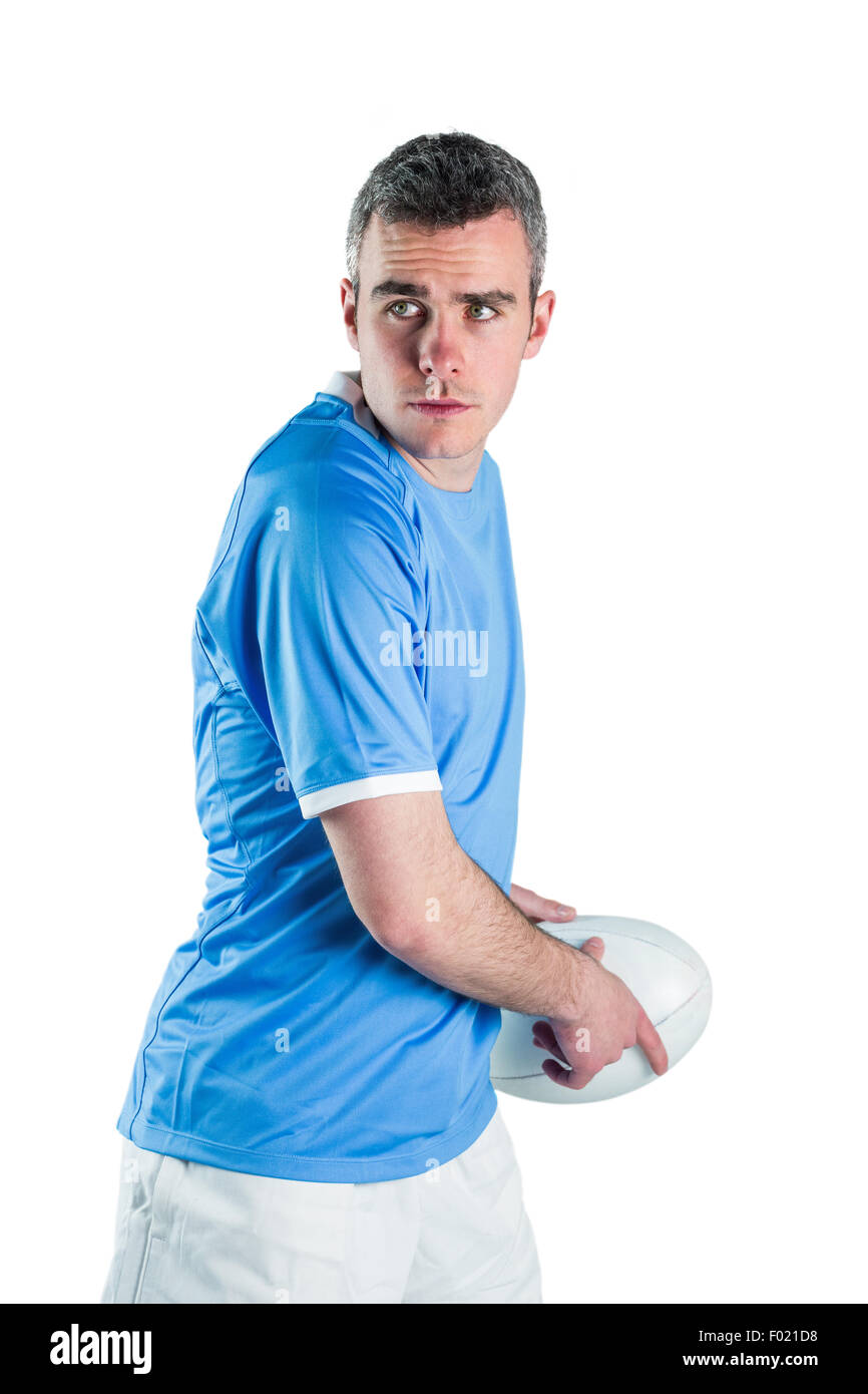 Rugby player throwing a rugby ball Stock Photo - Alamy