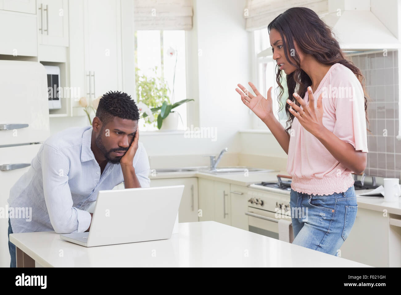 Couple having an argument Stock Photo - Alamy