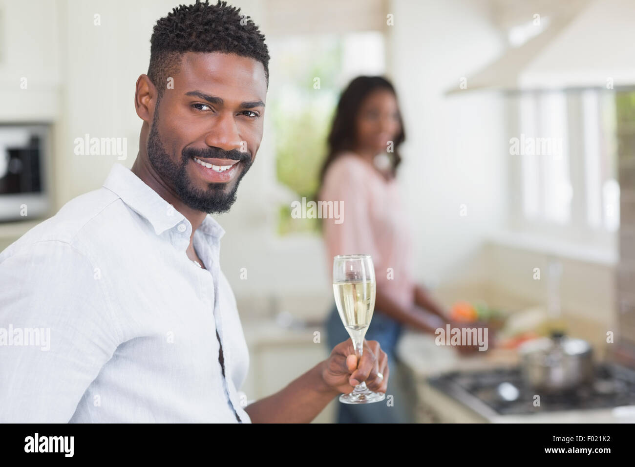 Happy man smiling at camera Stock Photo - Alamy