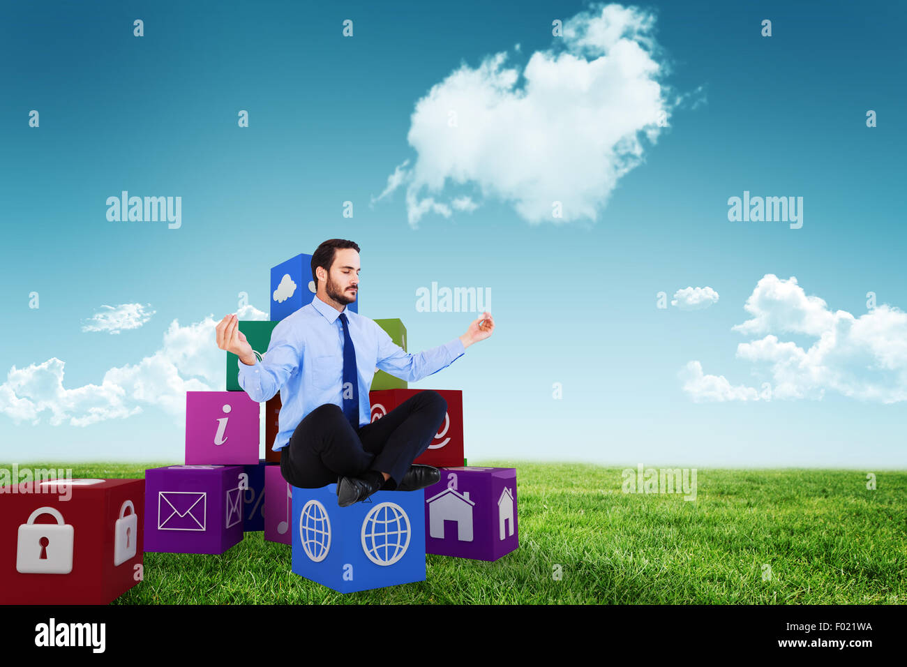 Composite image of businessman in suit sitting in lotus pose Stock ...