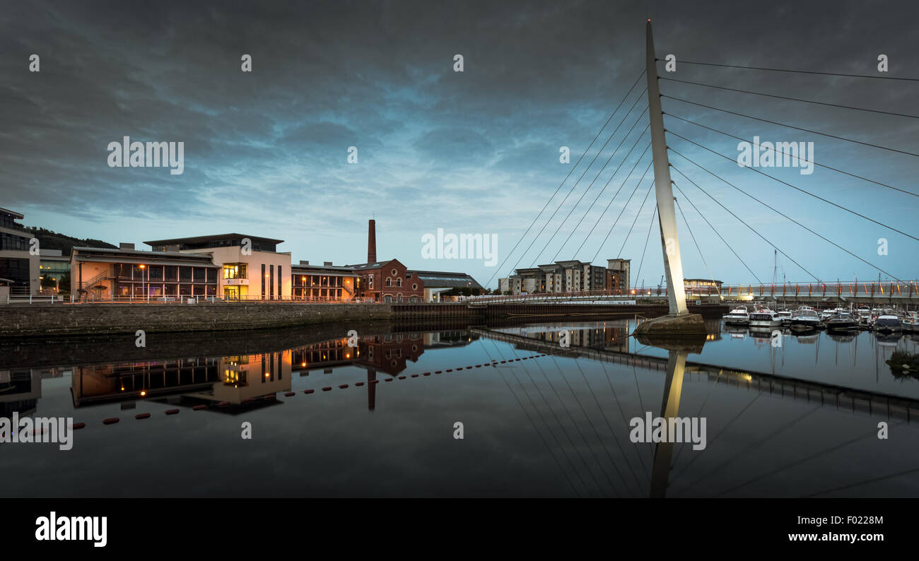 The Millennium bridge, Swansea, also known as the Sail bridge Stock ...