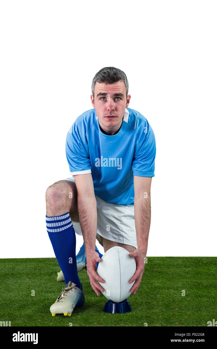 Rugby player ready to make a drop kick Stock Photo - Alamy