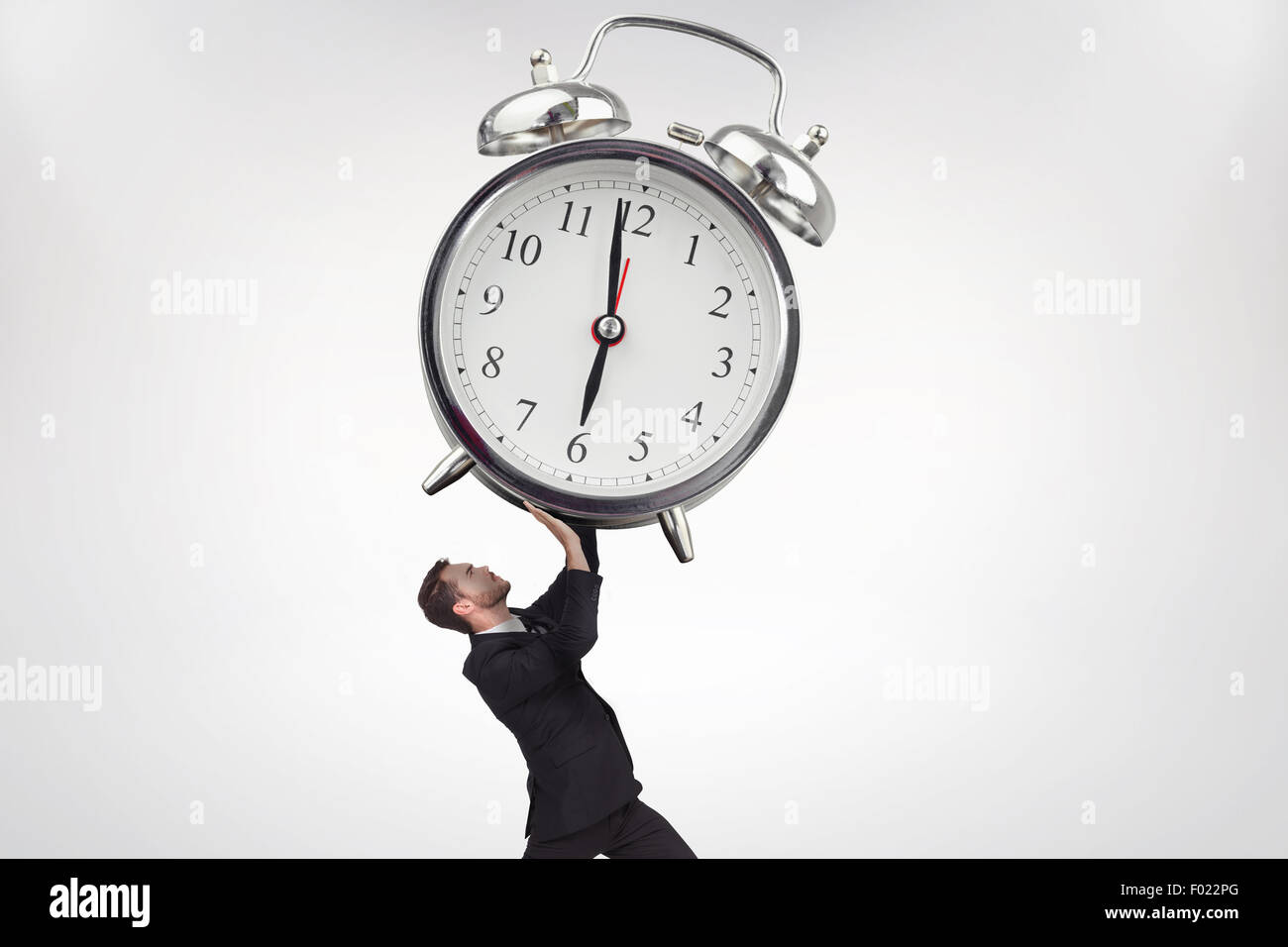Composite image of focused businessman pushing with hands Stock Photo ...