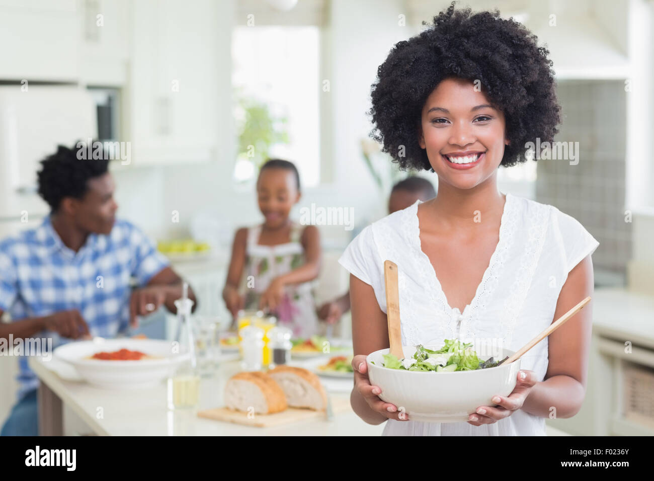 Happy mother smiling at camera Stock Photo - Alamy