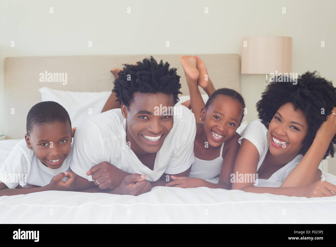 Happy family having fun together Stock Photo - Alamy