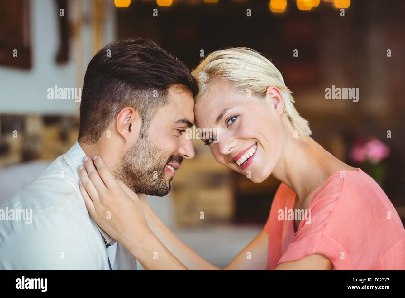 Couple taking a cup of coffee Stock Photo - Alamy