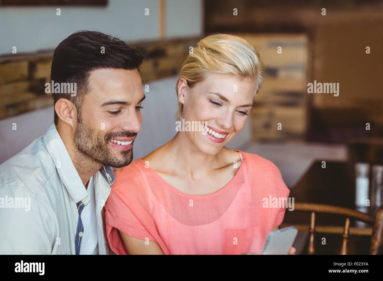 couple hanging out in a coffee shop Stock Photo - Alamy