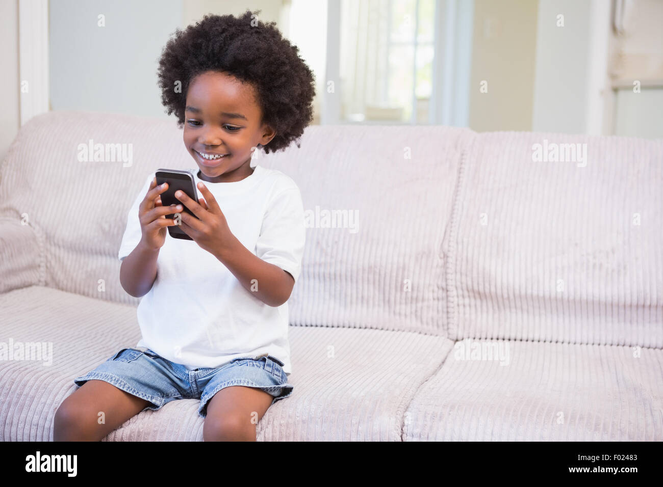 A little boy using a technology Stock Photo - Alamy