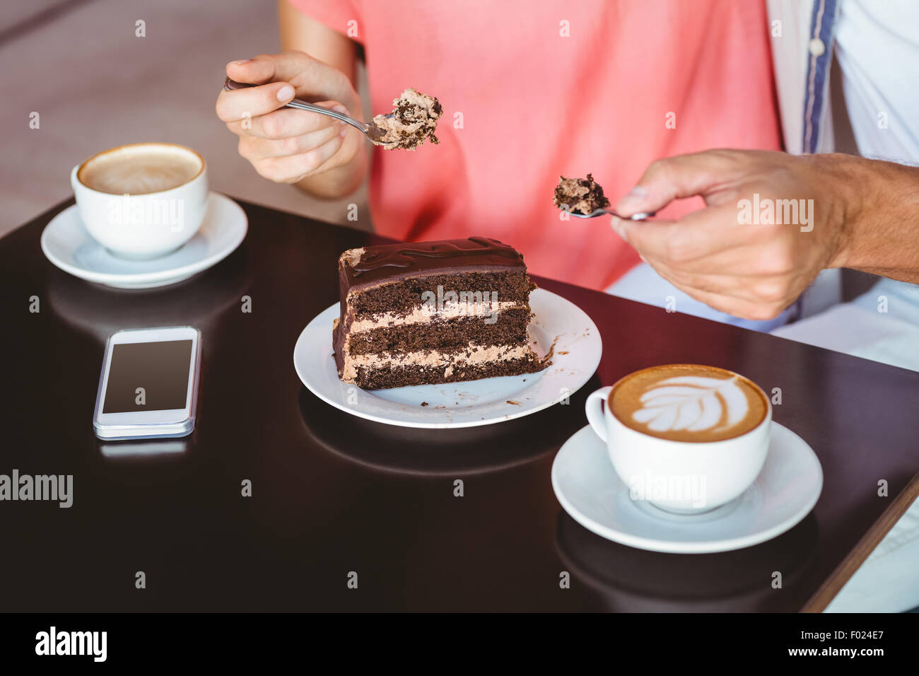 Sharing a chocolate hi-res stock photography and images - Alamy