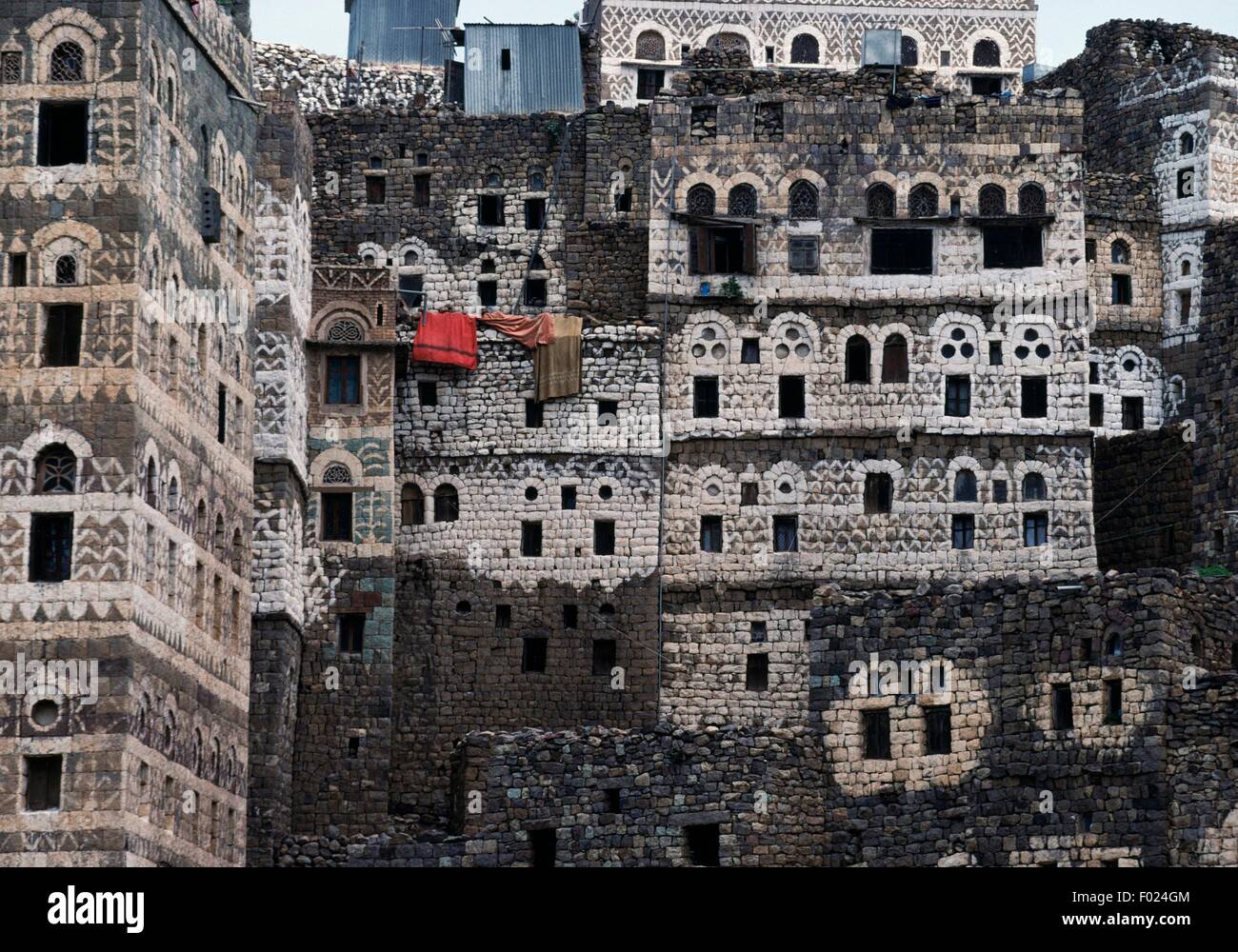 Buildings constructed onto the rock in Al Hajjarah, Yemen Stock Photo ...