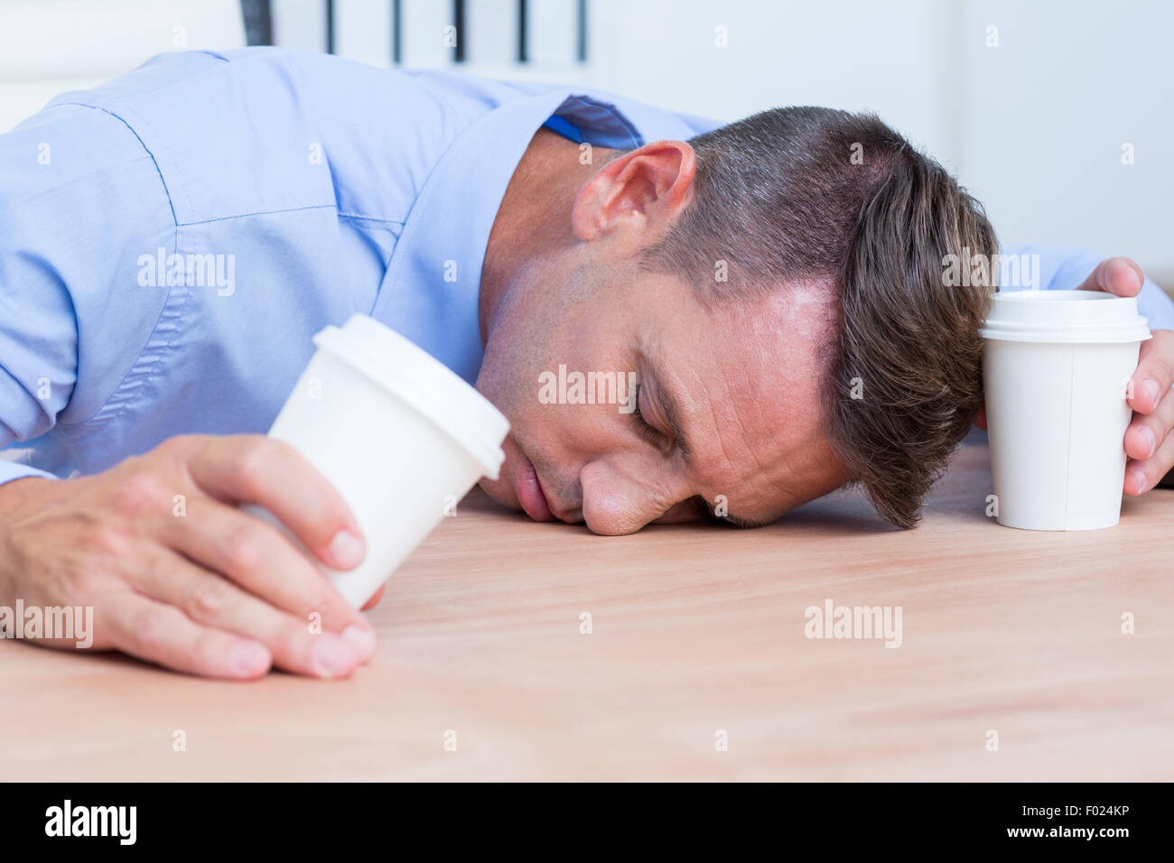 Businessman sleeping desk hi-res stock photography and images - Alamy