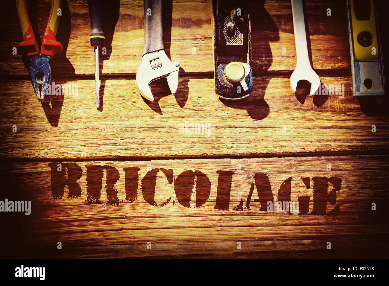 Bricolage against desk with tools Stock Photo - Alamy