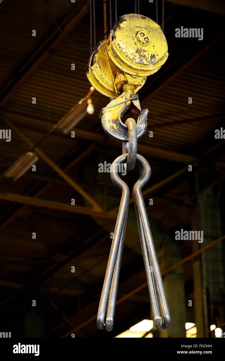 Industrial yellow hook used for transportation inside a factory Stock ...