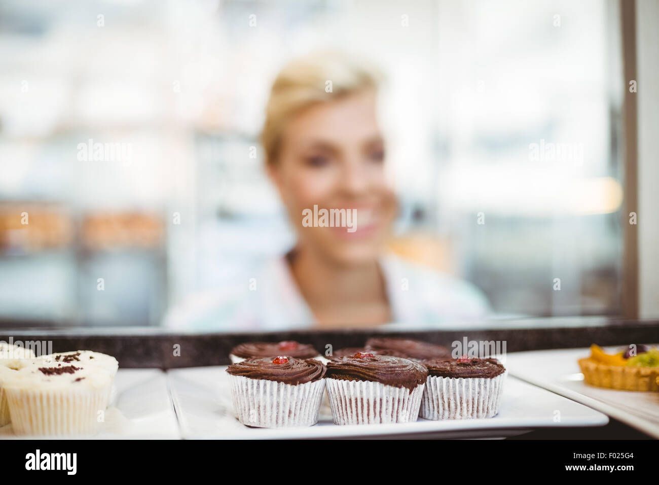 Woman and cakes hi-res stock photography and images - Alamy