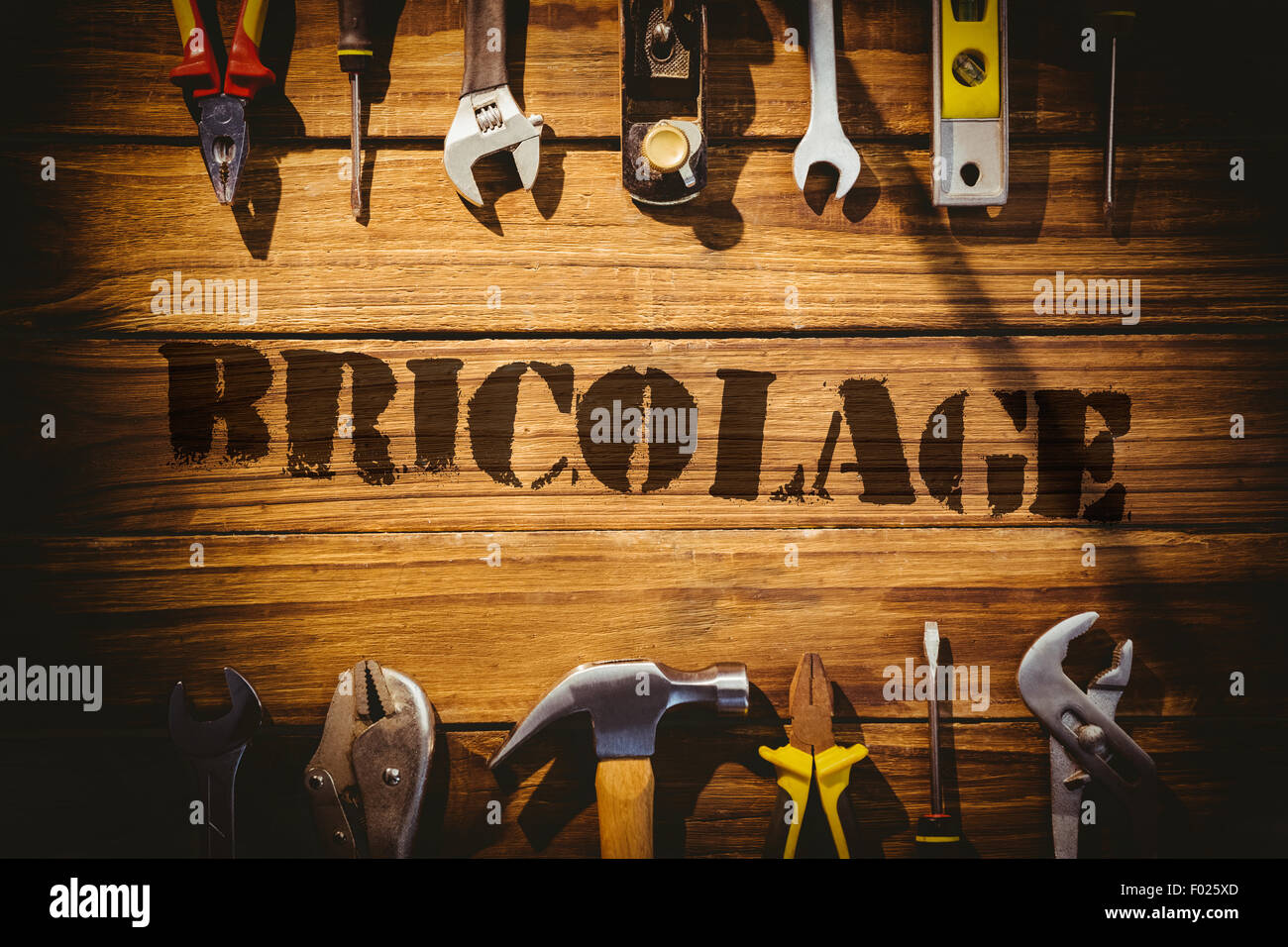 Bricolage against desk with tools Stock Photo - Alamy