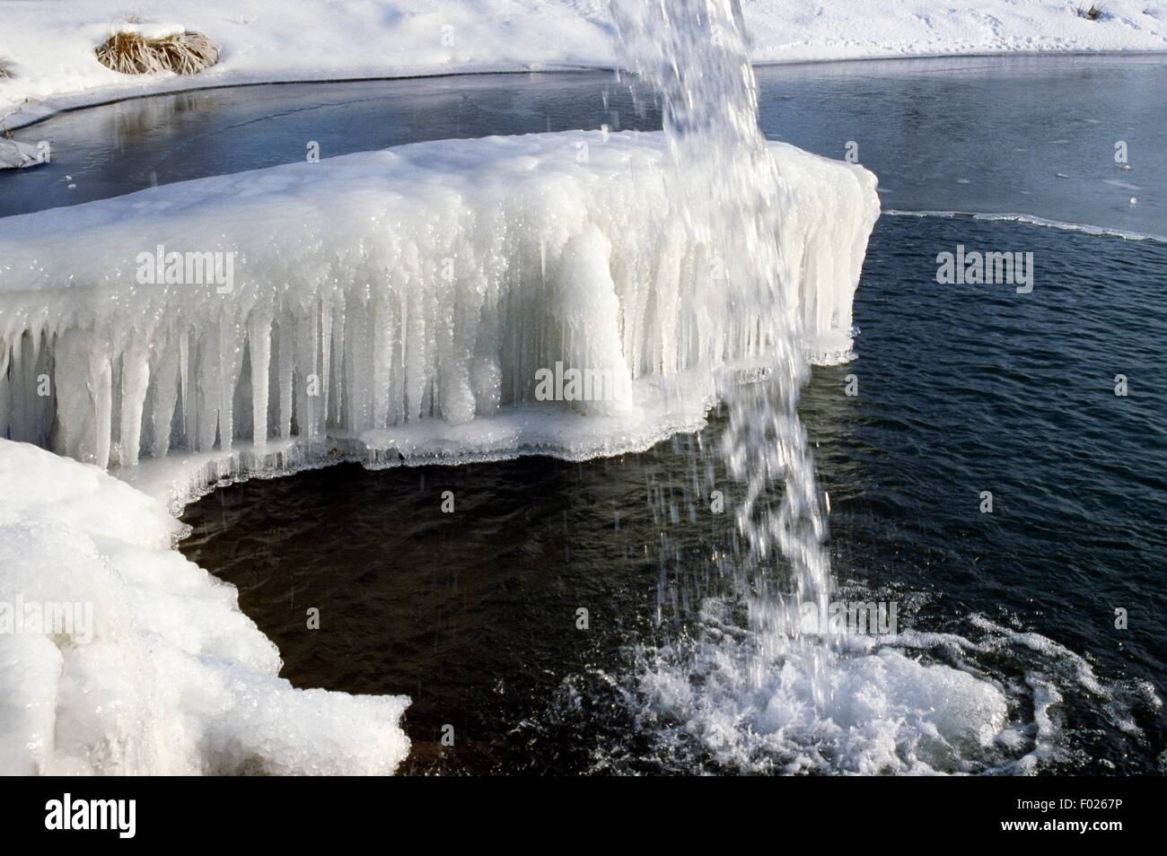 Dripping water and ice formation Stock Photo - Alamy