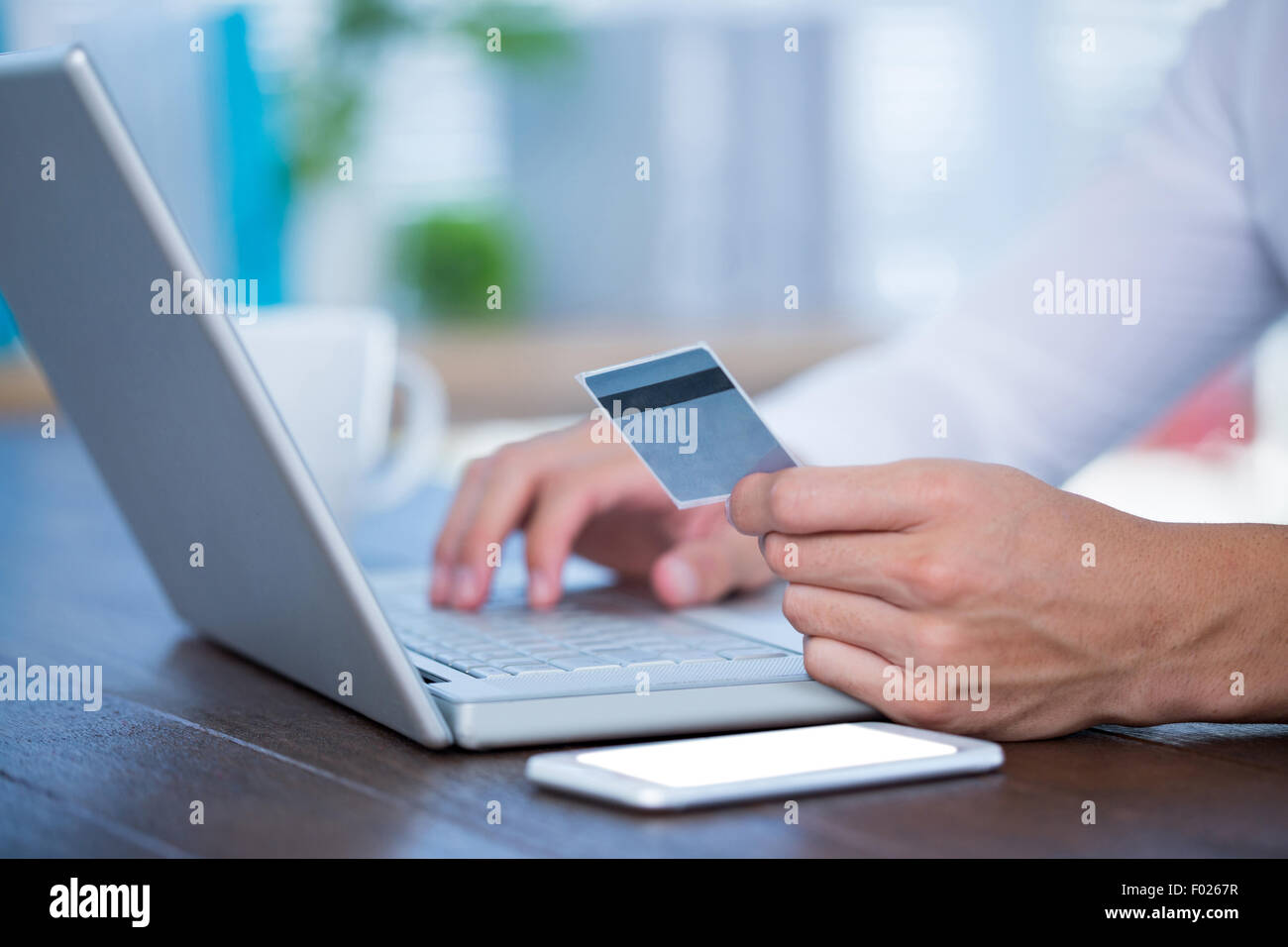 Businessman using smartphone credit card hi-res stock photography and ...
