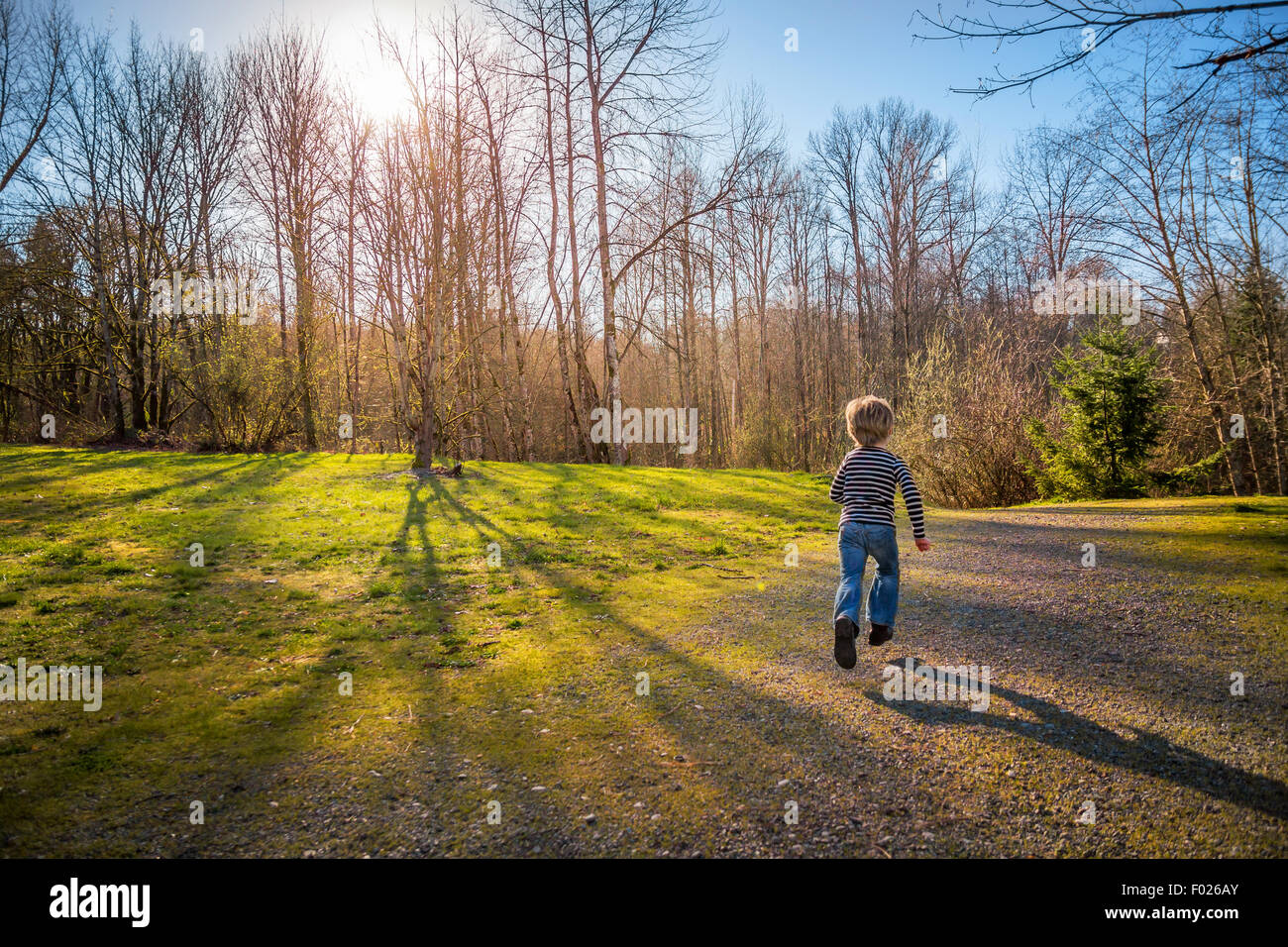 Boy running hi-res stock photography and images - Alamy