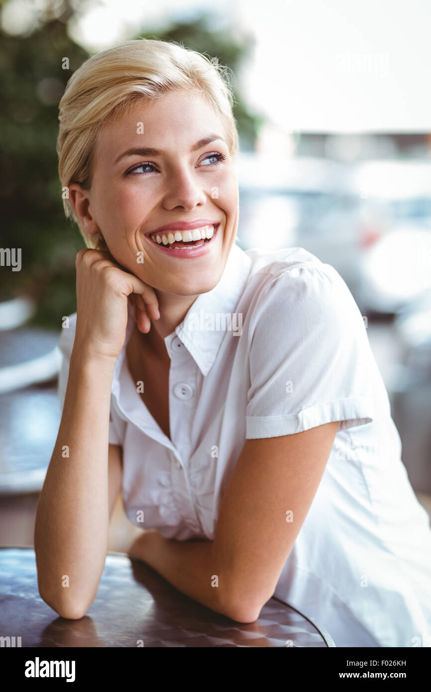 Cafe owner smiling Stock Photo - Alamy