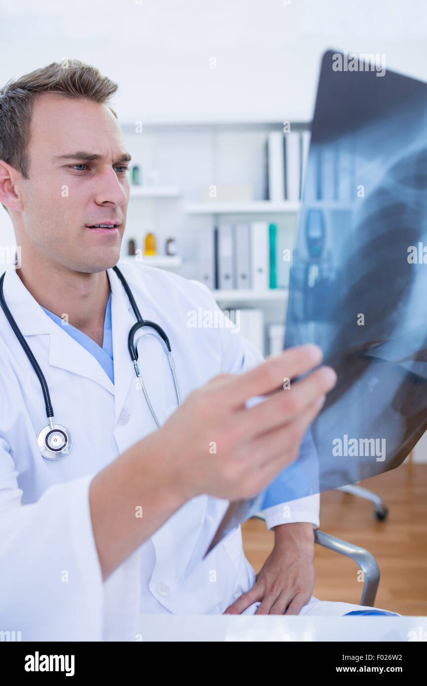 Doctor looking at xray hi-res stock photography and images - Alamy